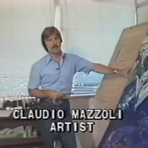 Claudio Mazzoli with his mural at the entrance to Spaceship Earth ...